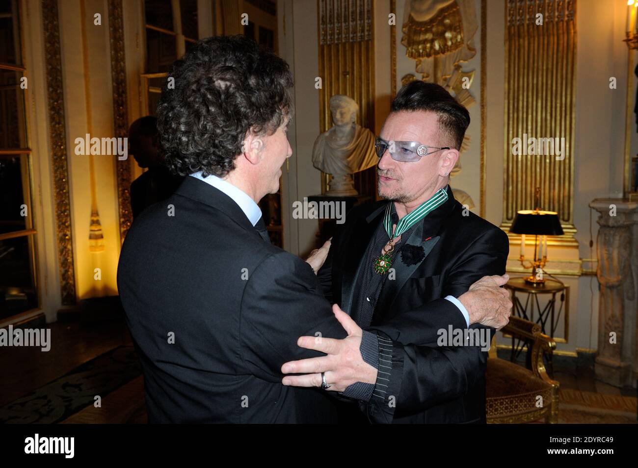 attending the ceremony where Bono is made 'Commandeur de l'ordre des ...