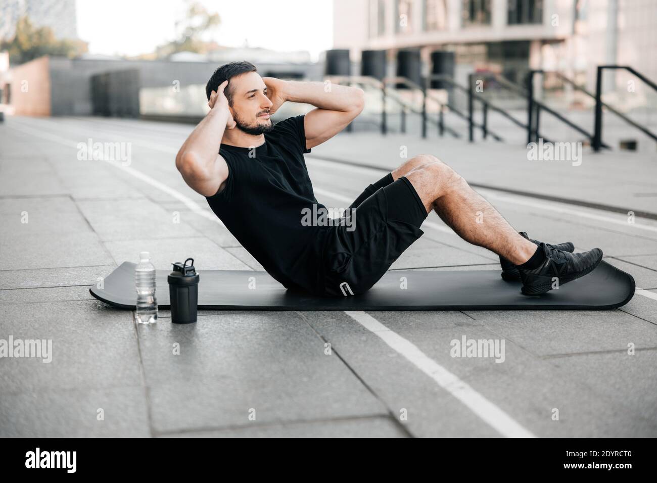 Muscular smiling man lying on hi-res stock photography and images - Alamy