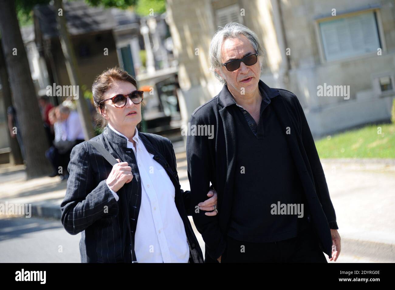 Richard Berry, Anouk Aimee attending the funeral of French actress ...
