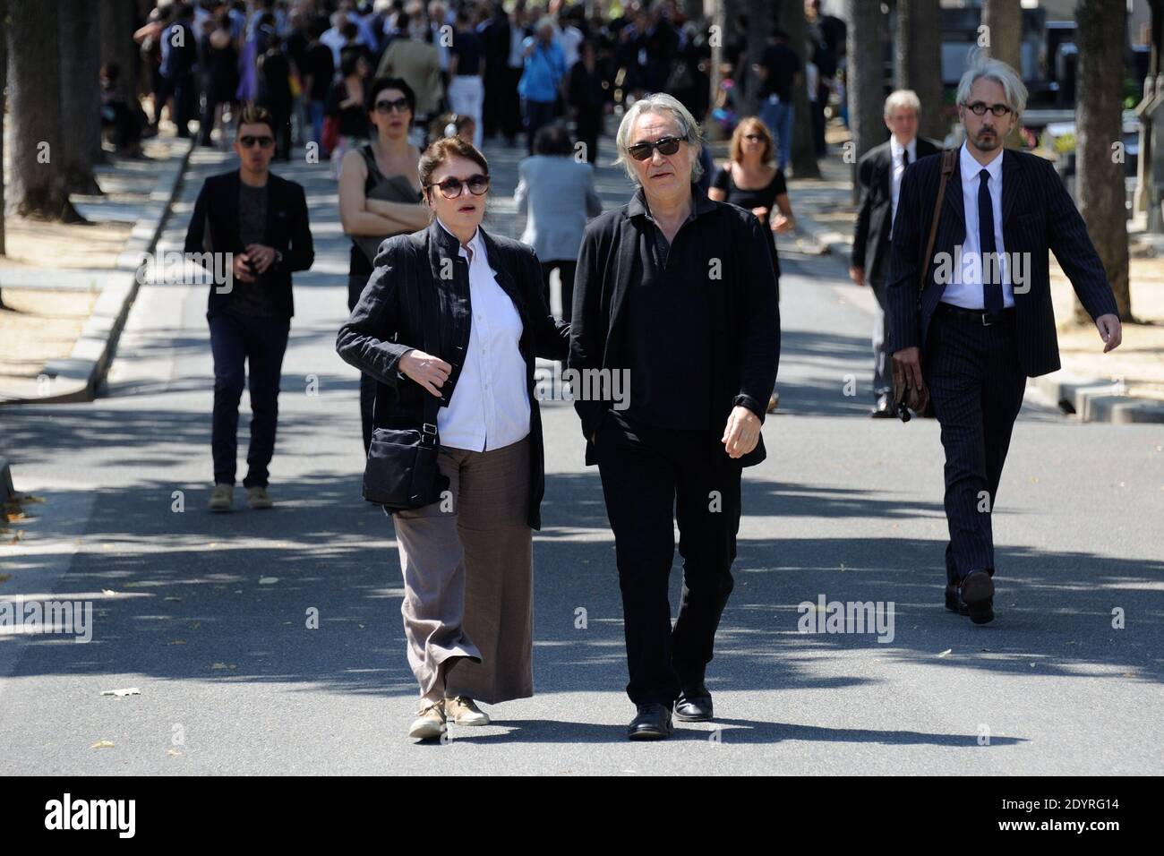 Richard Berry, Anouk Aimee attending the funeral of French actress ...