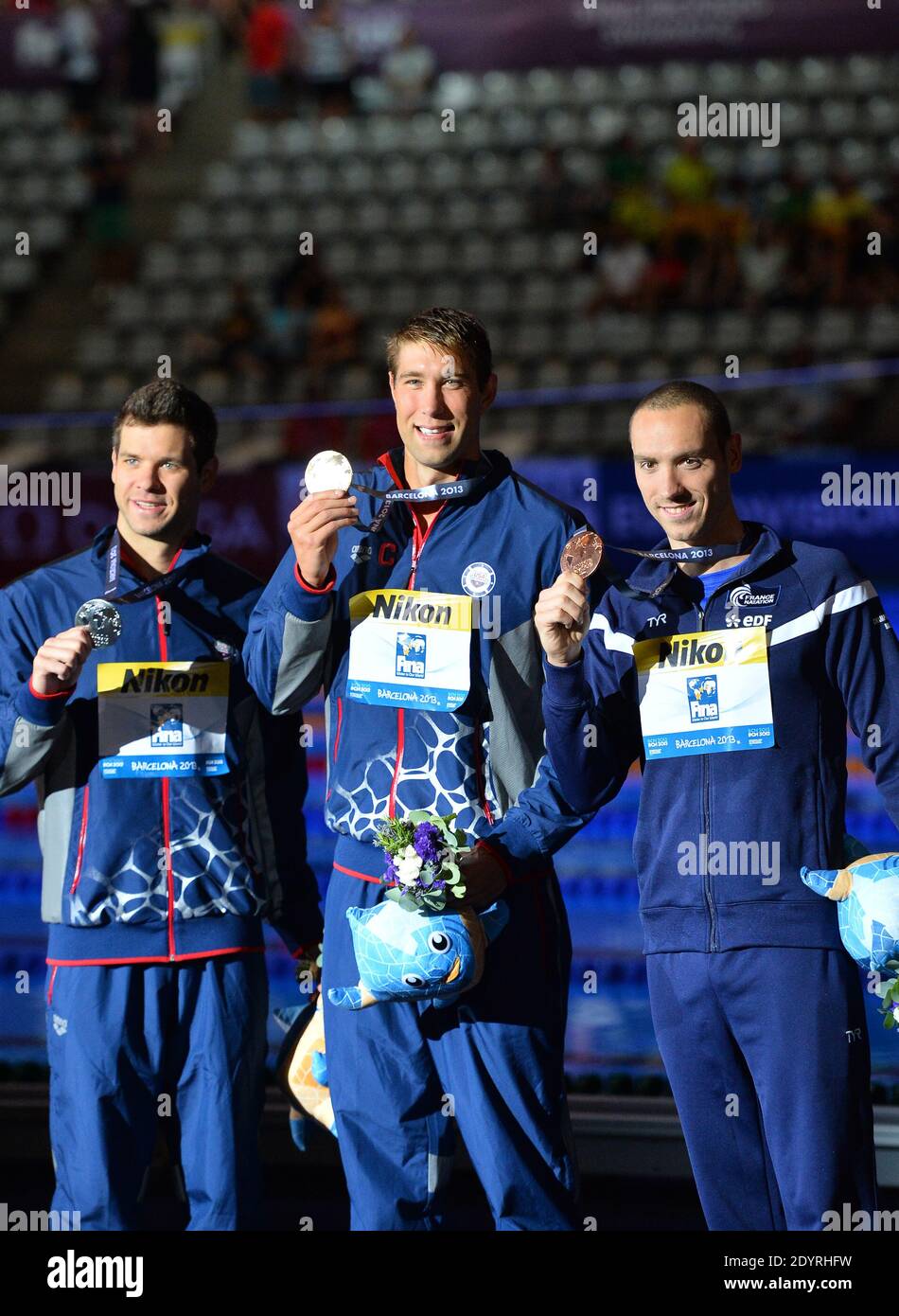 Matt Grevers (C) and David Plummer (L) of the United States, Jeremy ...