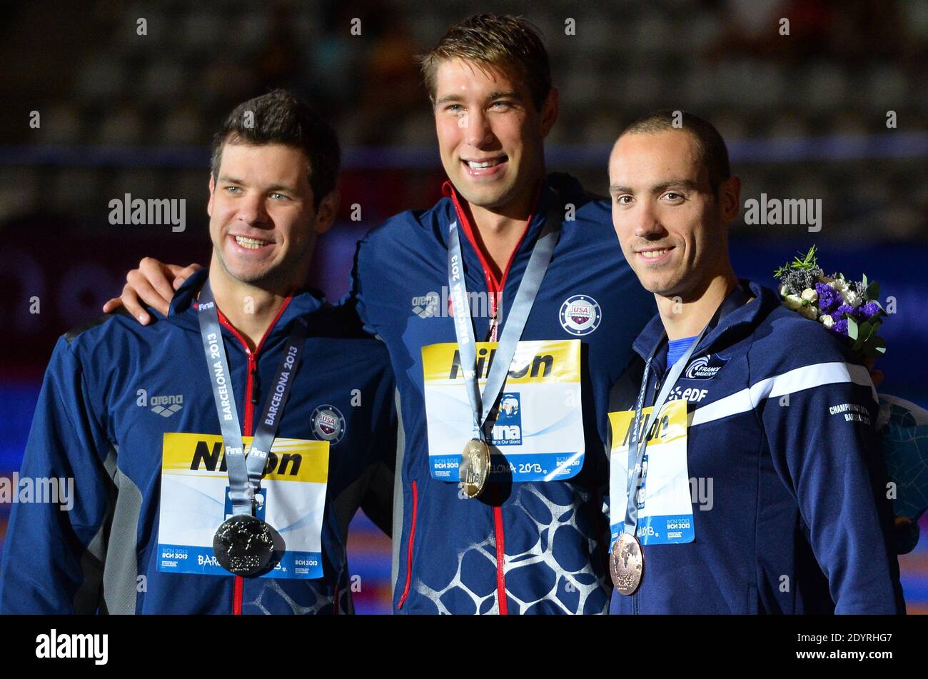 Matt Grevers (C) and David Plummer (L) of the United States, Jeremy ...