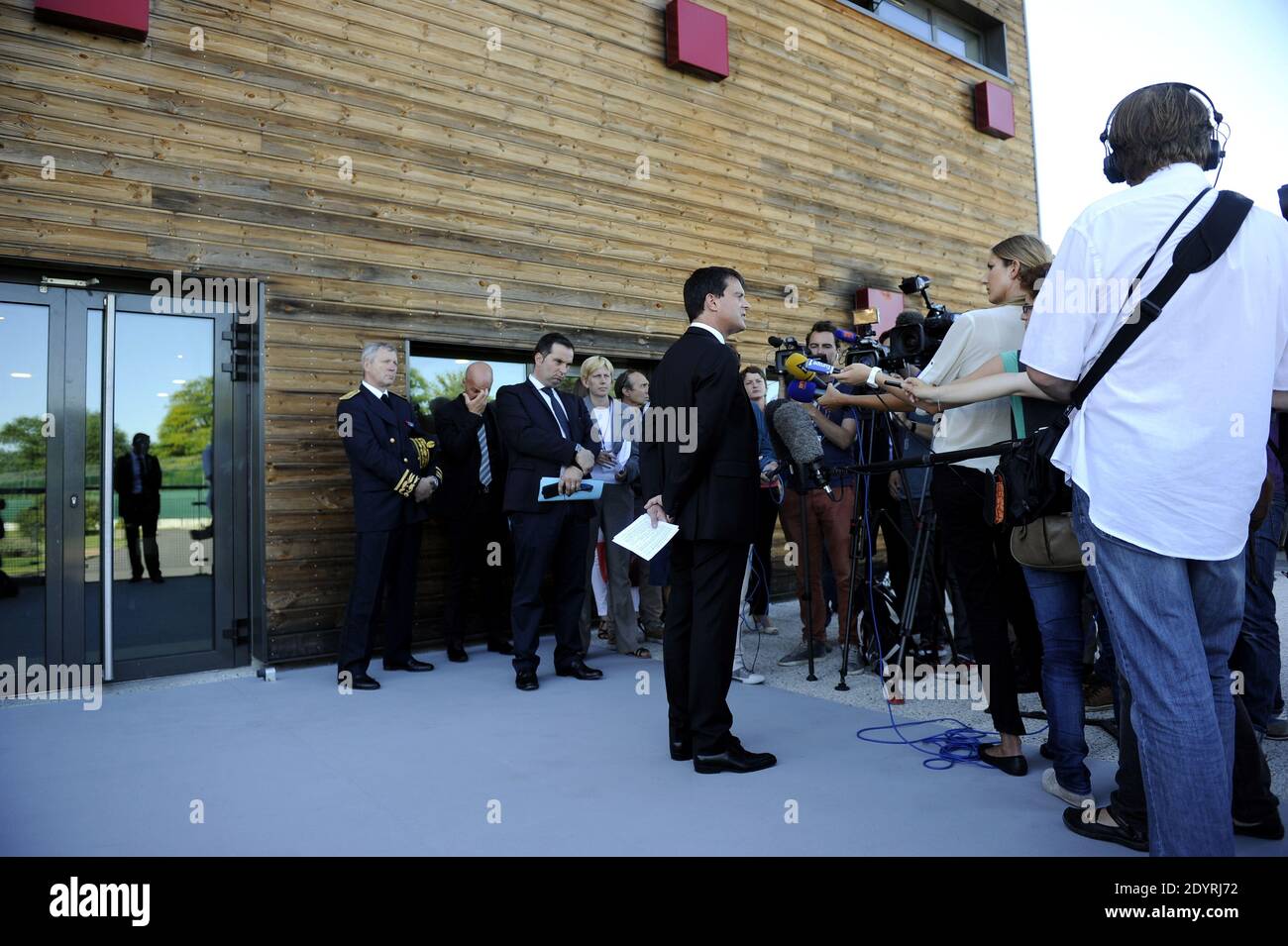 Interior Minister Manuel Valls answers medias whilst visiting the ...