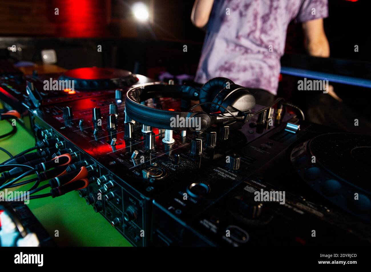 DJ ending working shift. Job in nightclub. Close up photo of disk ...