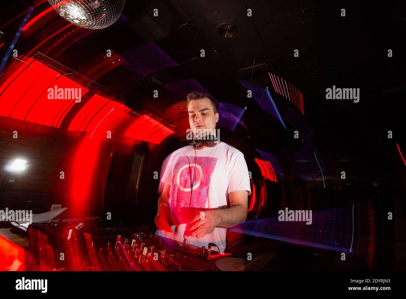 Dj works on mixer nightclub hi-res stock photography and images - Alamy