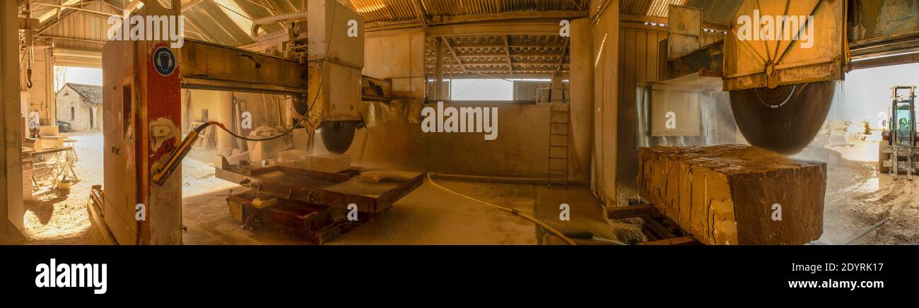 Limestone stone cutting circular saw in operation Stock Photo - Alamy