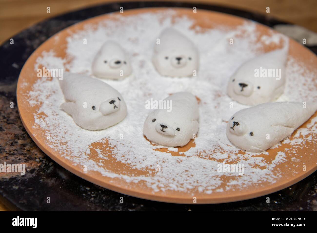 A delicious plate of marsh mellows in the shape of a cute winter seal ...