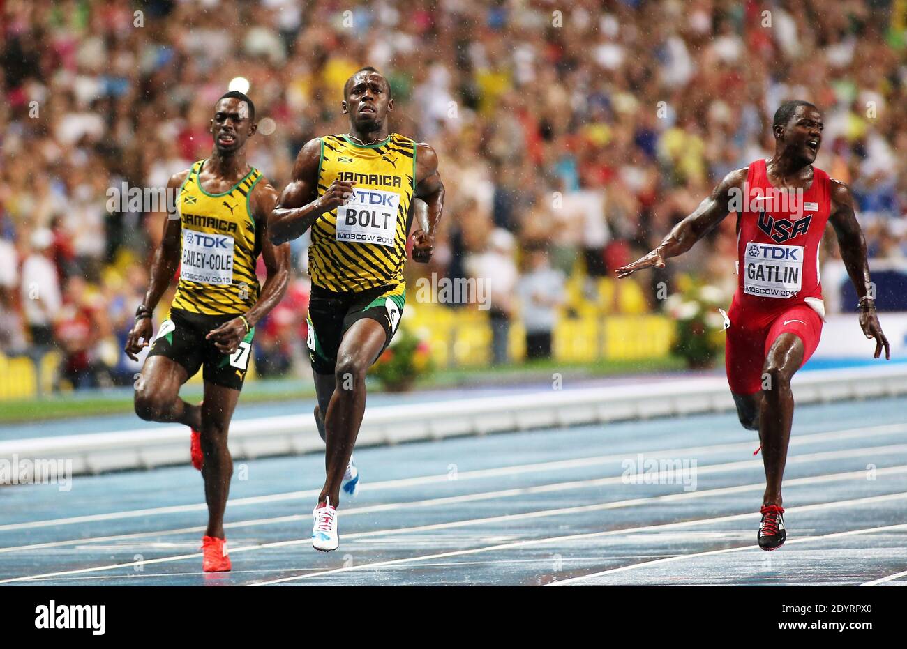 Usain Bolt of Jamaica (C) wins the 100m final ahead of Justin Gatlin (R ...
