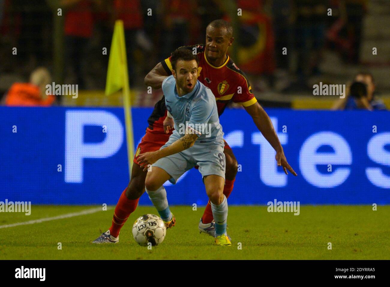 France's Mathieu Valbuena battles Belgium's Vincent Kompany during a ...