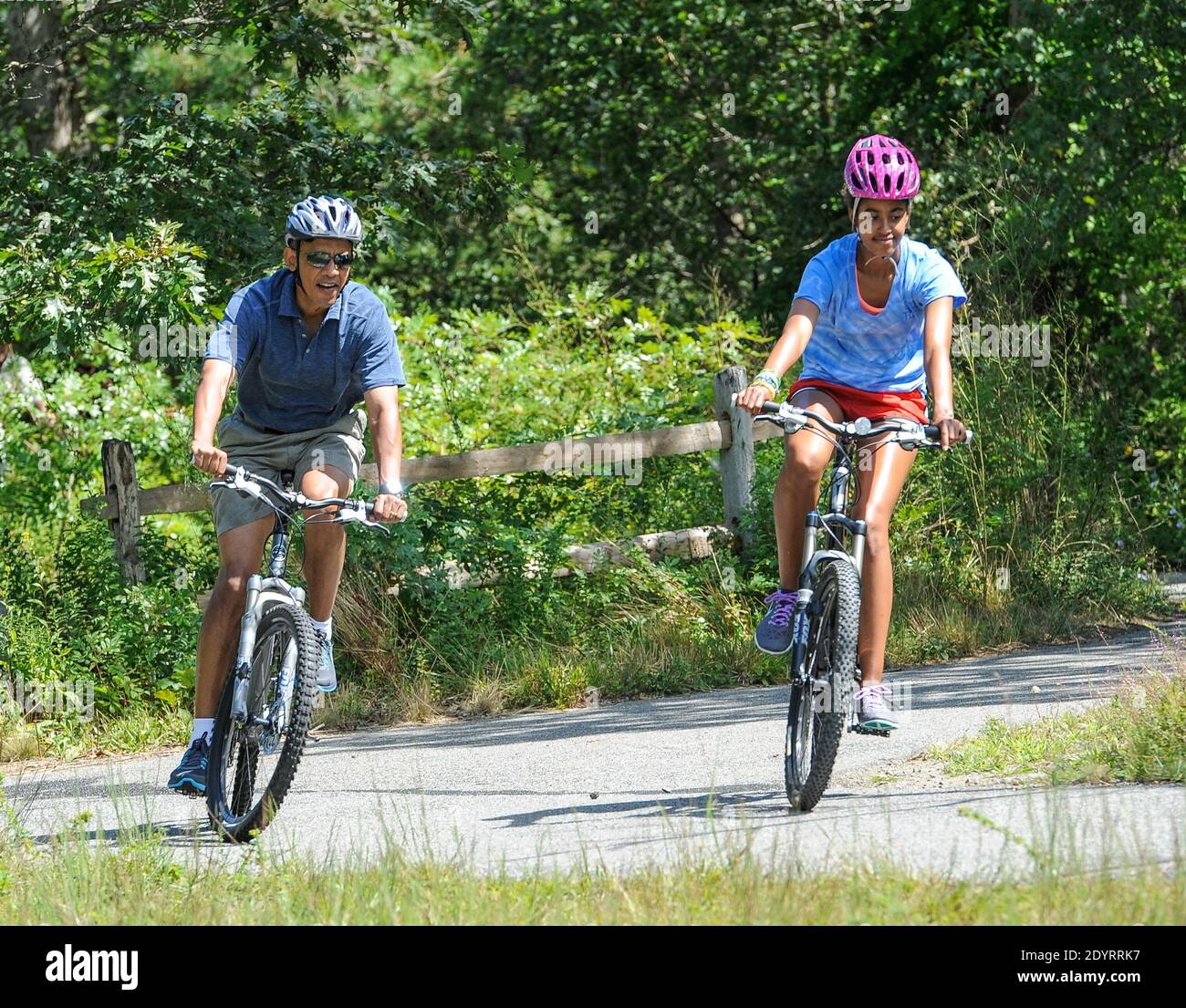 Michelle and barack obama bike hi-res stock photography and images - Alamy