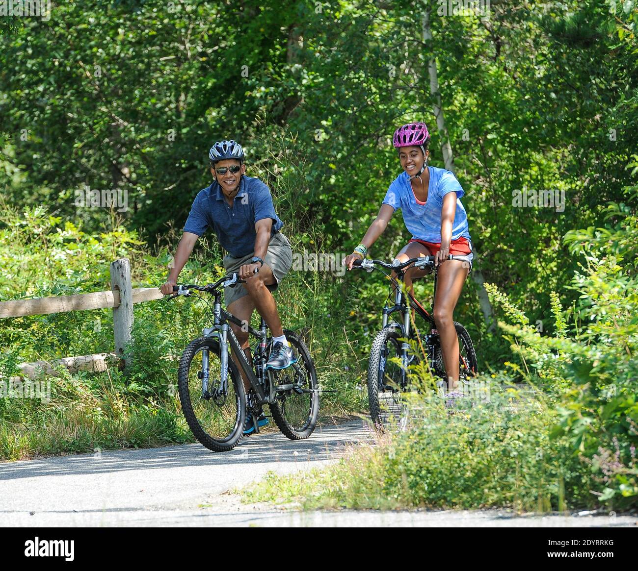 Michelle and barack obama bike hi-res stock photography and images - Alamy