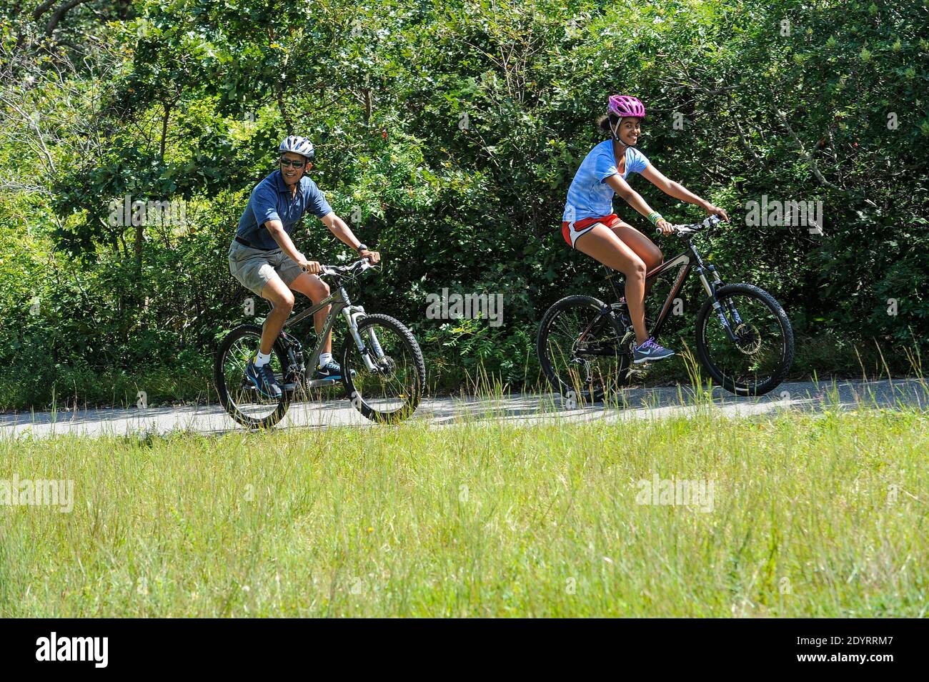 Michelle and barack obama bike hi-res stock photography and images - Alamy