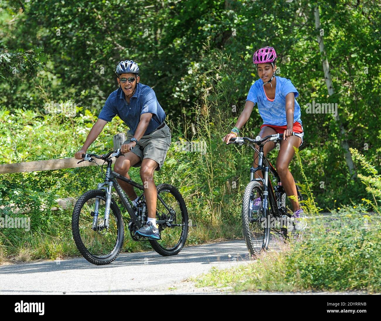 Michelle and barack obama bike hi-res stock photography and images - Alamy