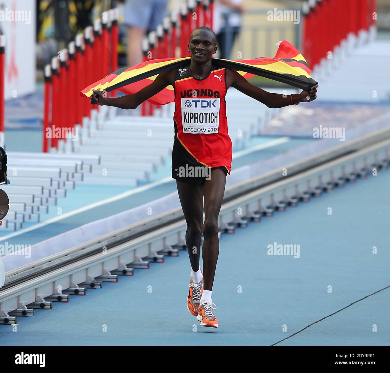Uganda's Stephen Kiprotich celebrates after winning the men's marathon ...
