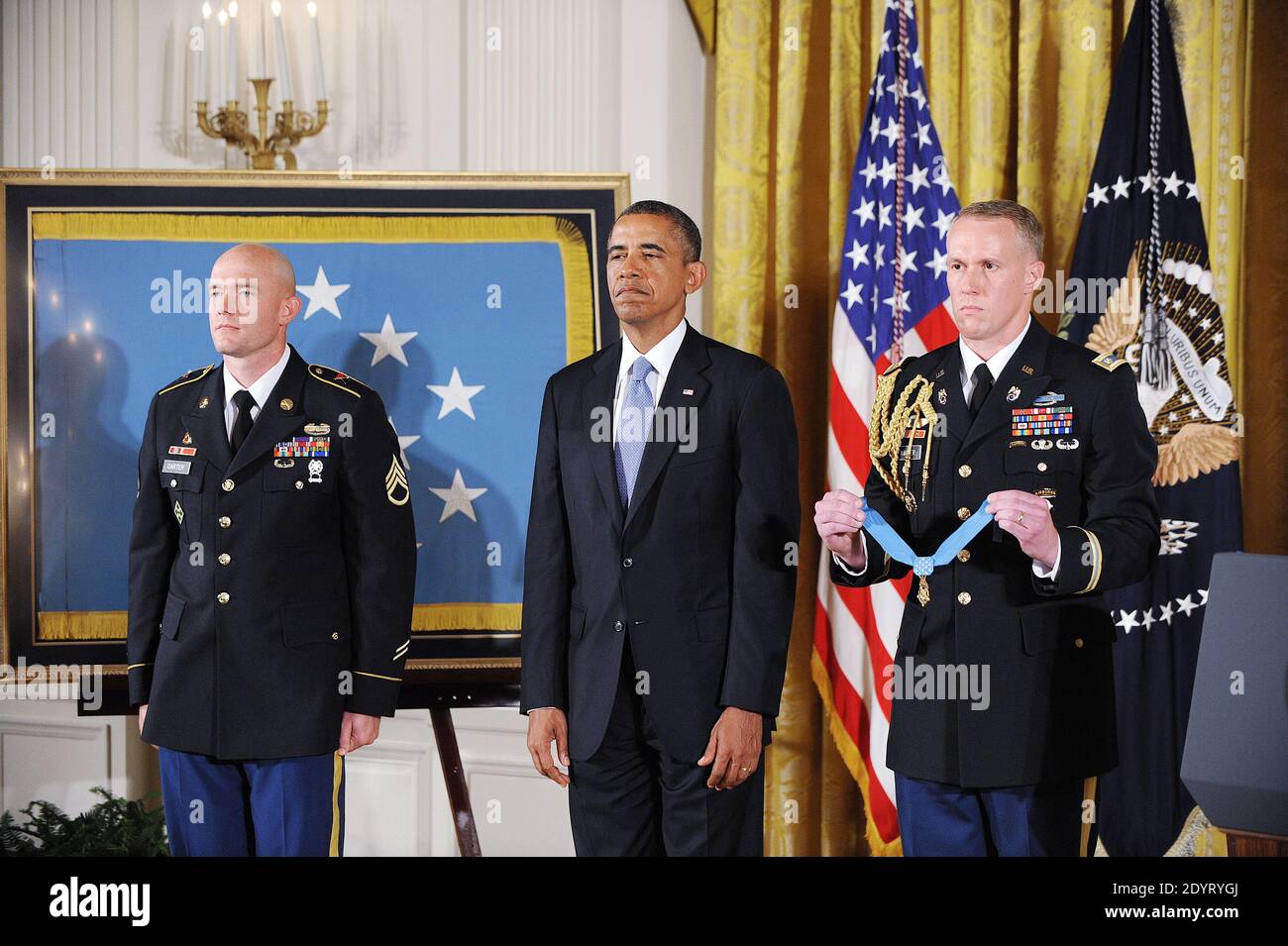 Staff Sergeant Ty M. Carter (L) receives the medal of honor from US ...