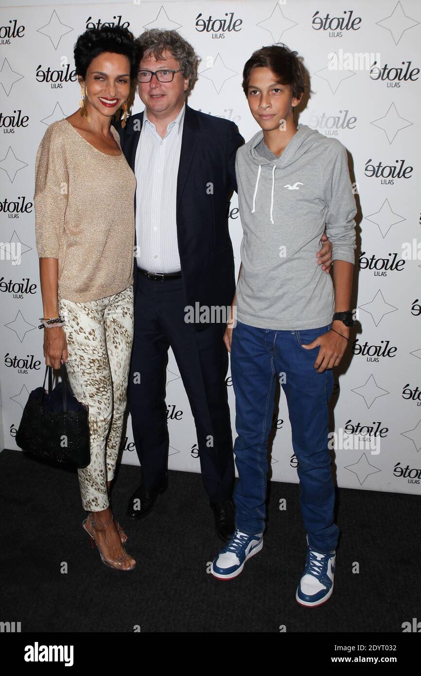 Farida Khelfa with her husband Henri Seydoux and a guest attending the ...