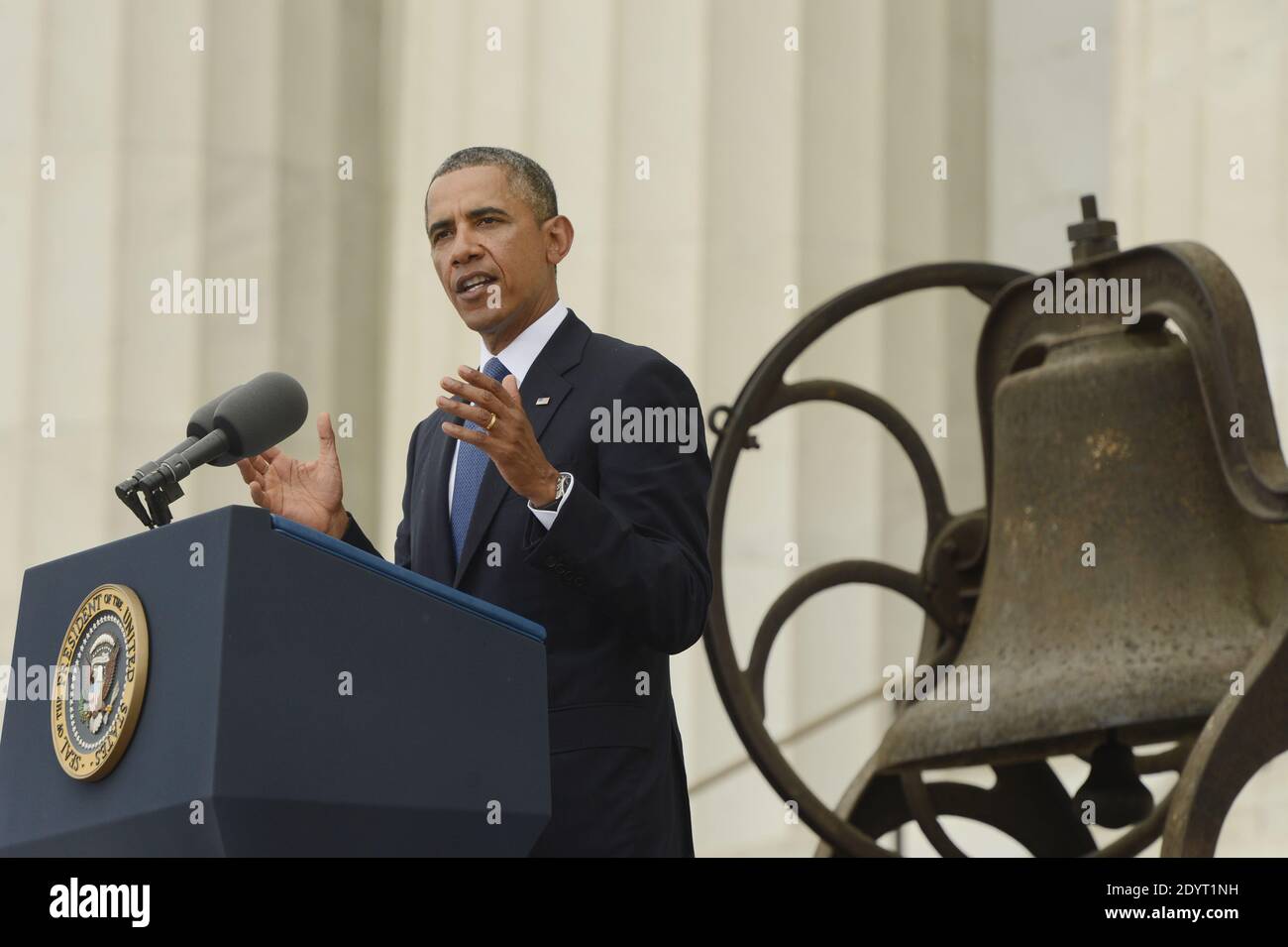US President Barack Obama delivers remarks in front of a freedom bell ...