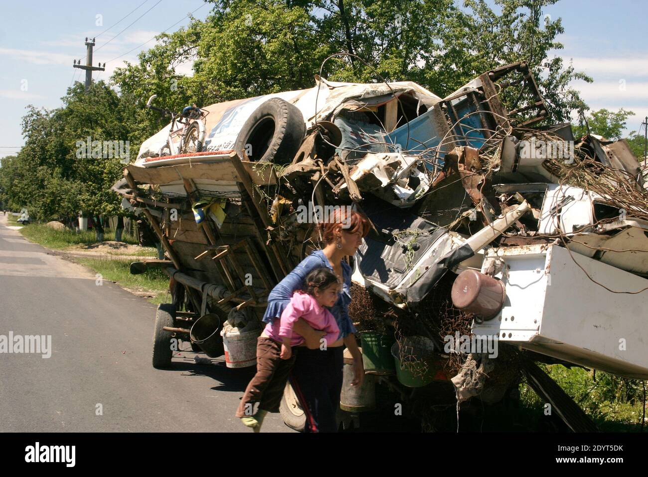 Cart overfilled with scrap metal collected by the gypsies in Romania to ...
