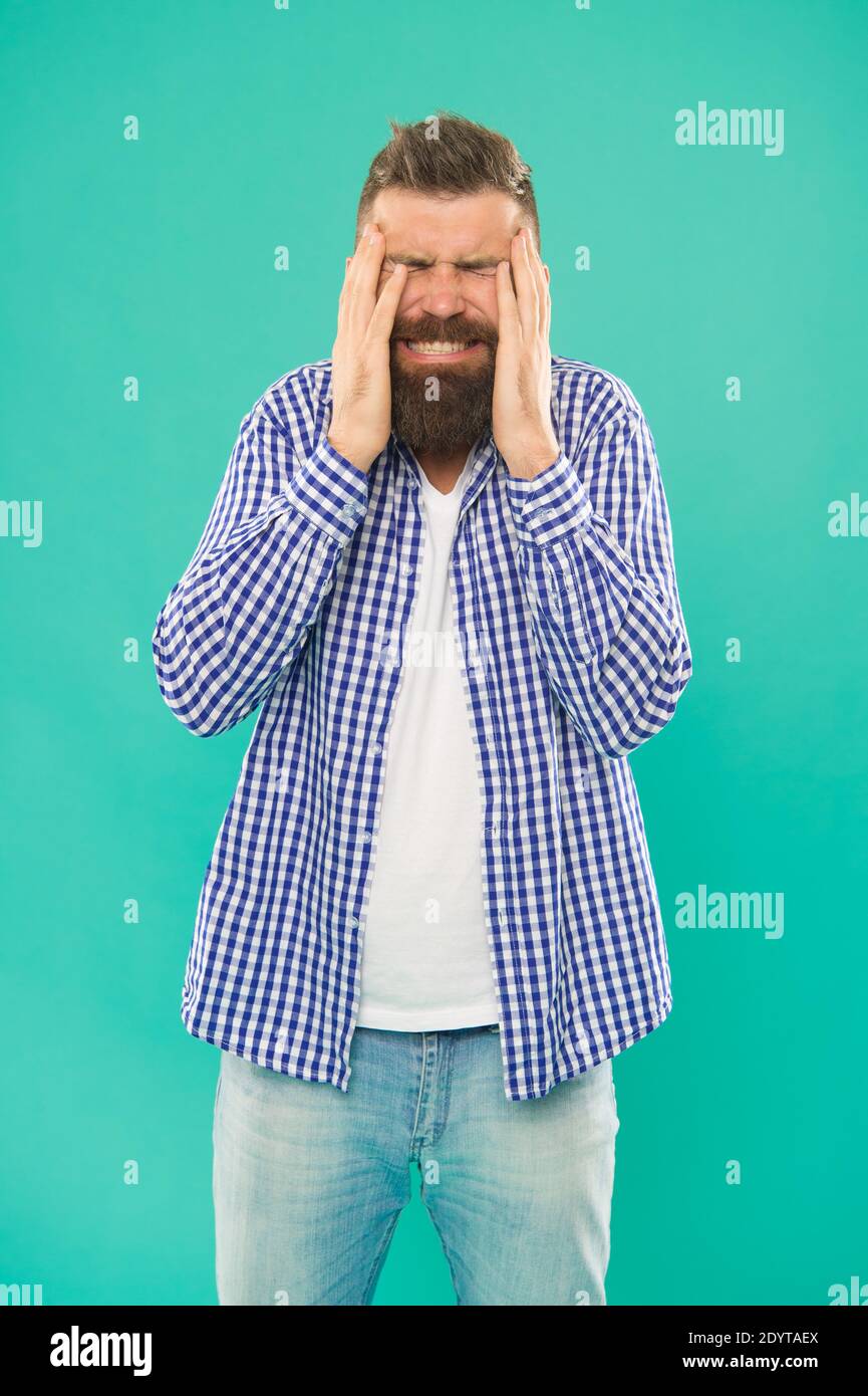 stressed caucasian guy with beard and mustache suffer from headache on ...