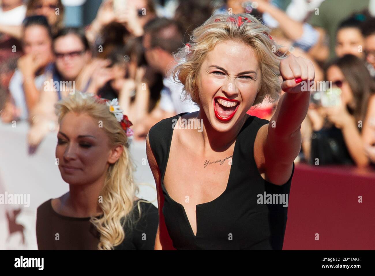 Femen activists with Inna Shevchenko and Sasha Shevchenko attending 'Sacro Gra' premiere during ...