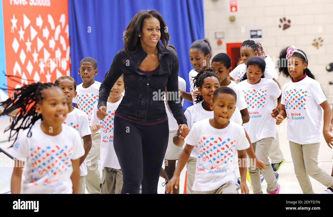 First Lady Michelle Obama participates in a physical activity with ...