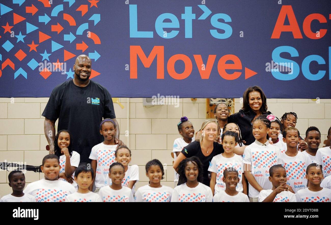 First Lady Michelle Obama and Shaquille O'Neal participate in a ...