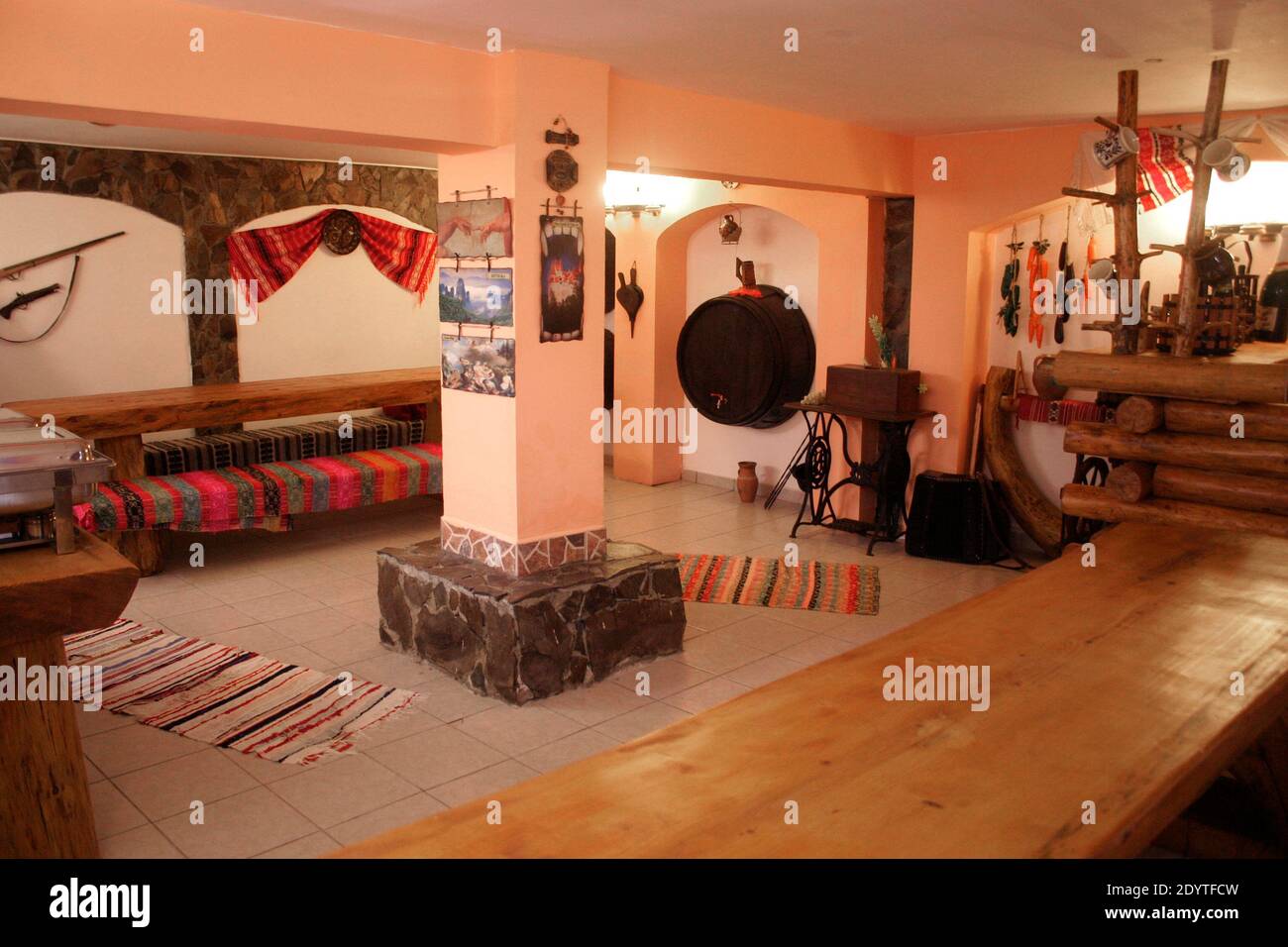 Bacau County, Romania. Interior of a restaurant with traditional rustic ...