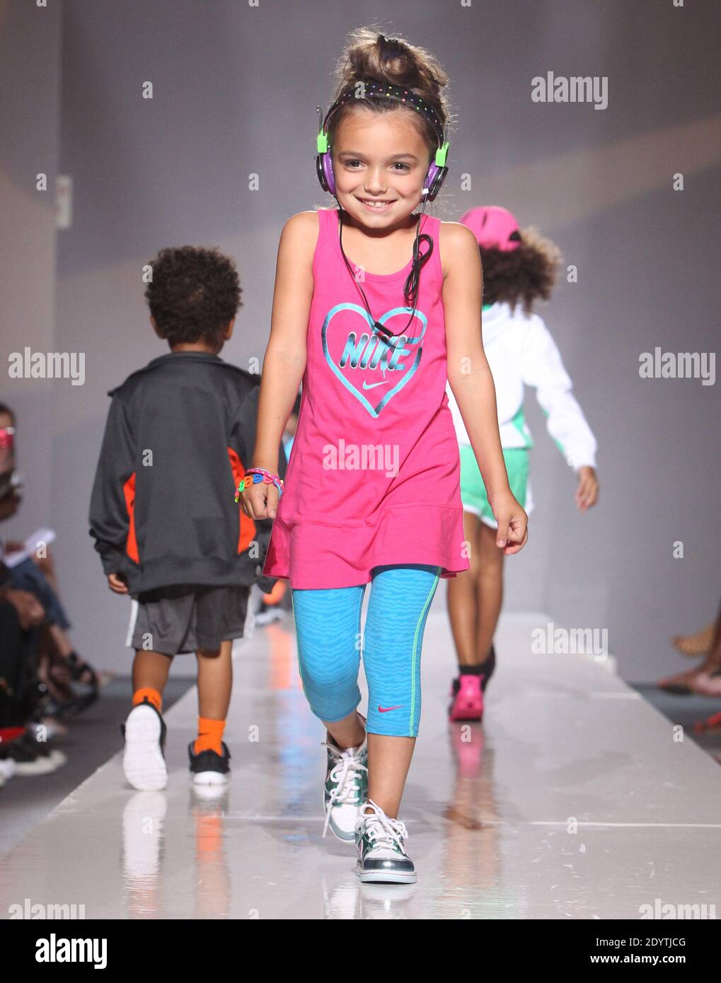 Young model walks the runway during the Kids Rock fashion show at Grand ...
