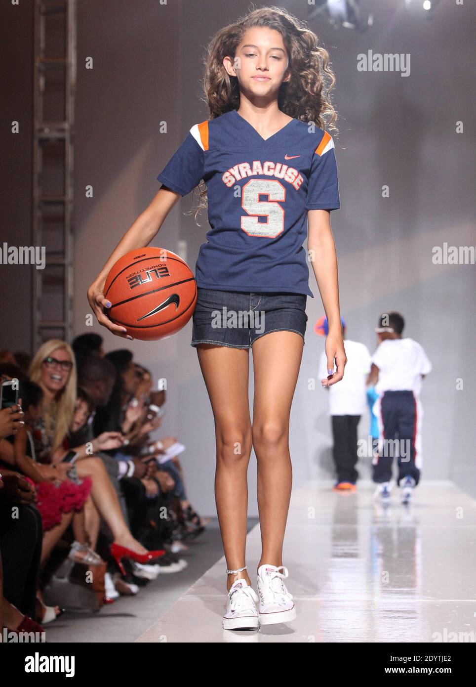 Young model walks the runway during the Kids Rock fashion show at Grand ...