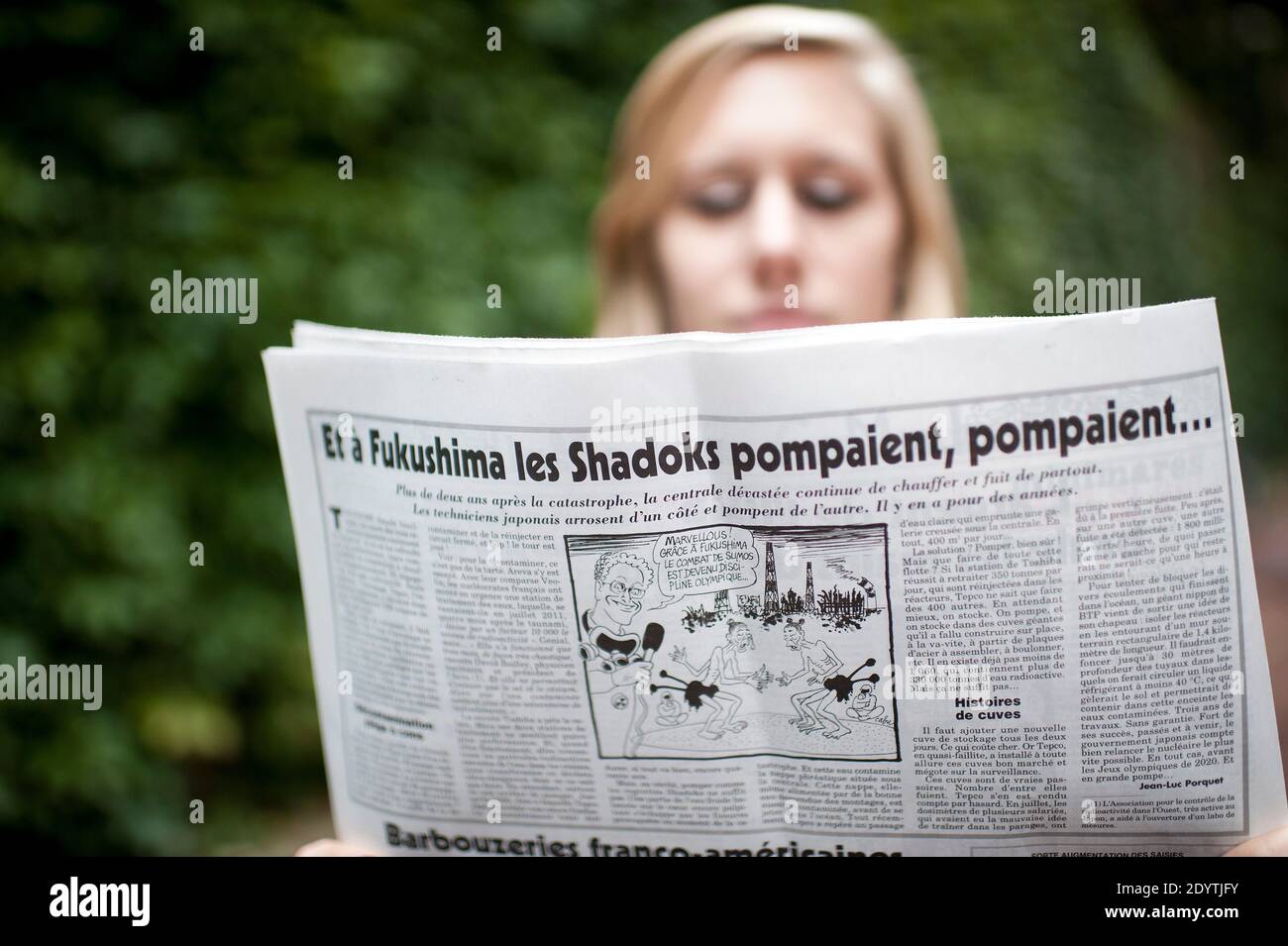French satirical paper 'Le Canard Enchaine' published a cartoon about ...
