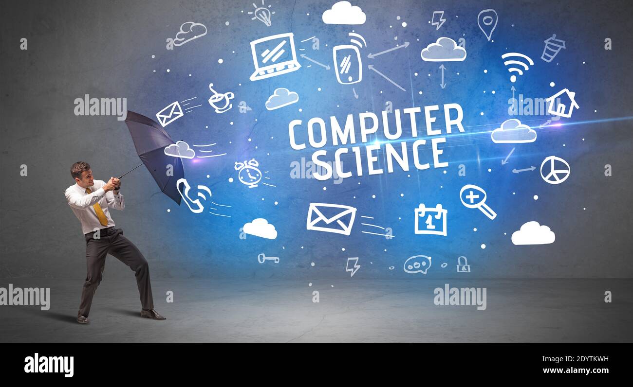 Businessman defending with umbrella from COMPUTER SCIENCE inscription ...