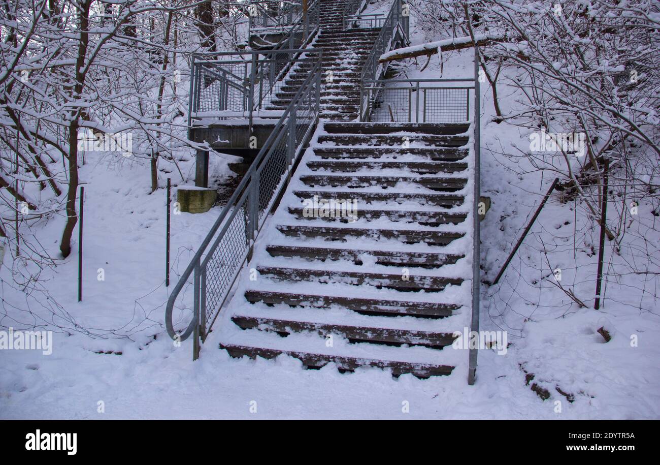 Snow on stairs in a park Stock Photo - Alamy