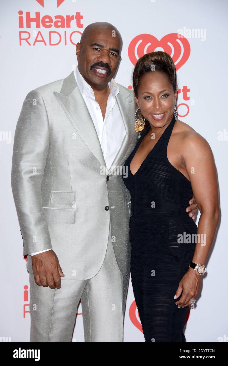 Steve Harvey and wife Marjorie Bridges pose in the press room of the ...