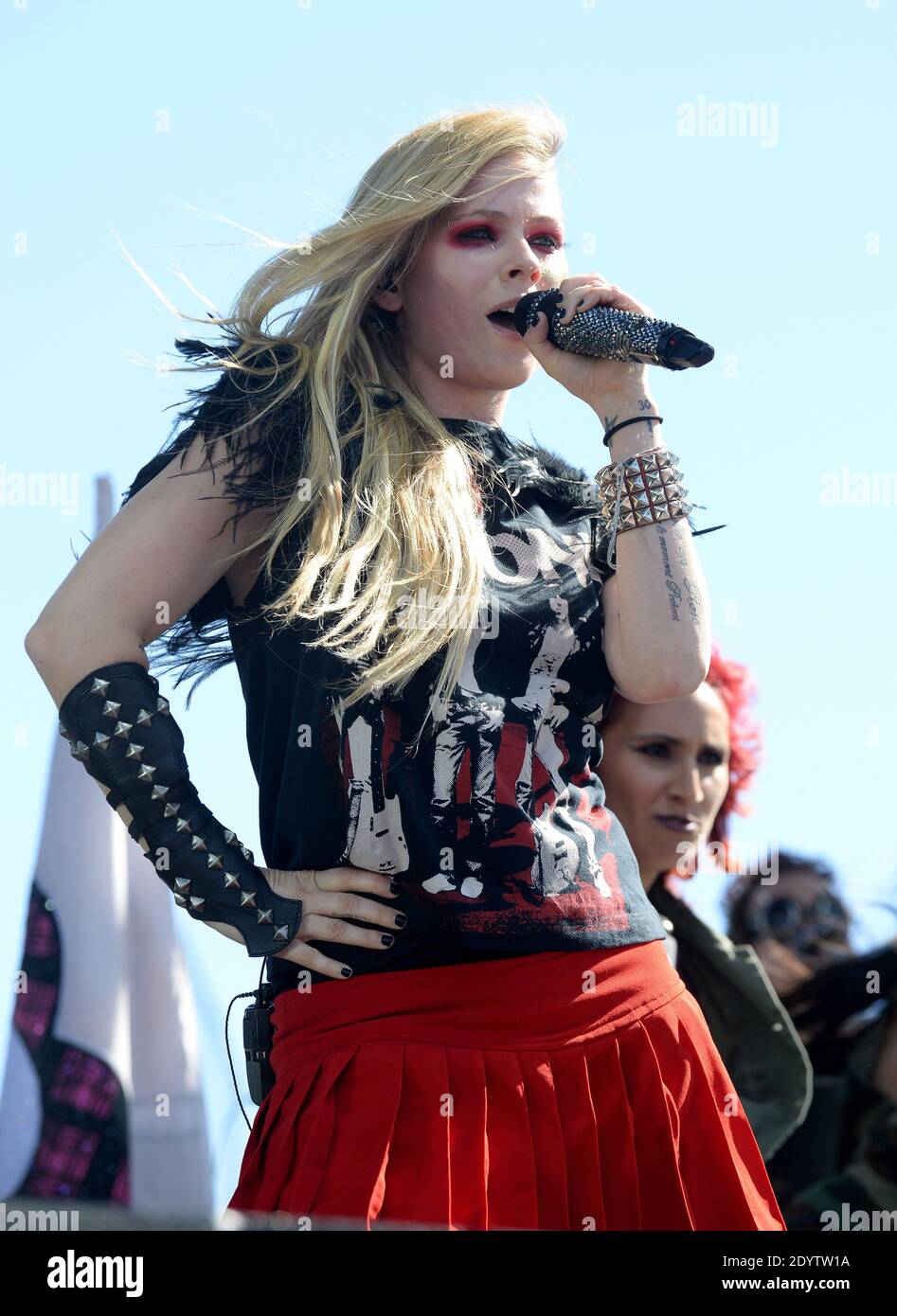 Avril Lavigne performs at the iHeart Village during the 2013 ...