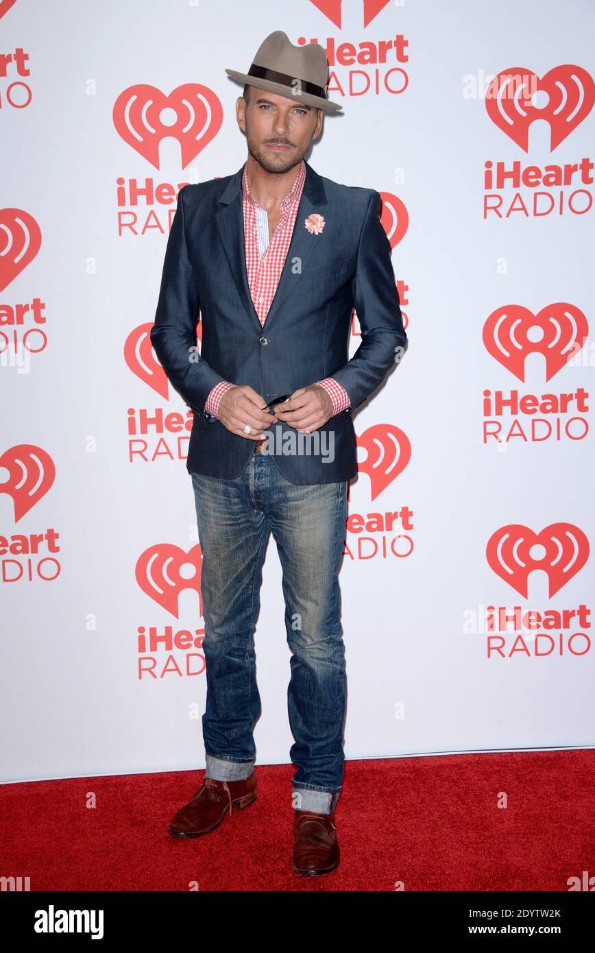 Matt Goss poses in the press room of the 2013 iHeartRadio Music ...