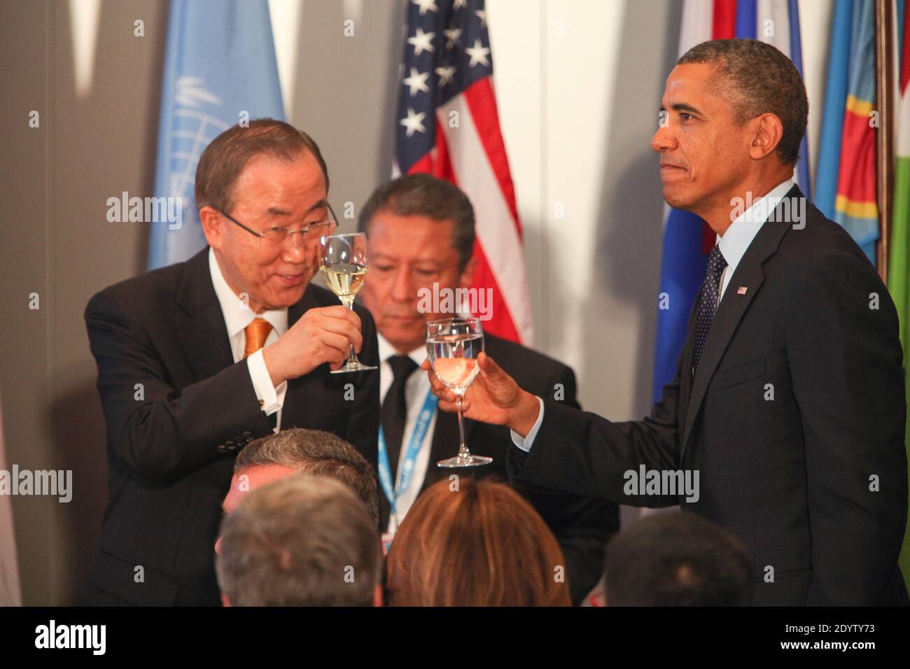 President Barack Obama joins in a toast at the Delegates Luncheon after ...