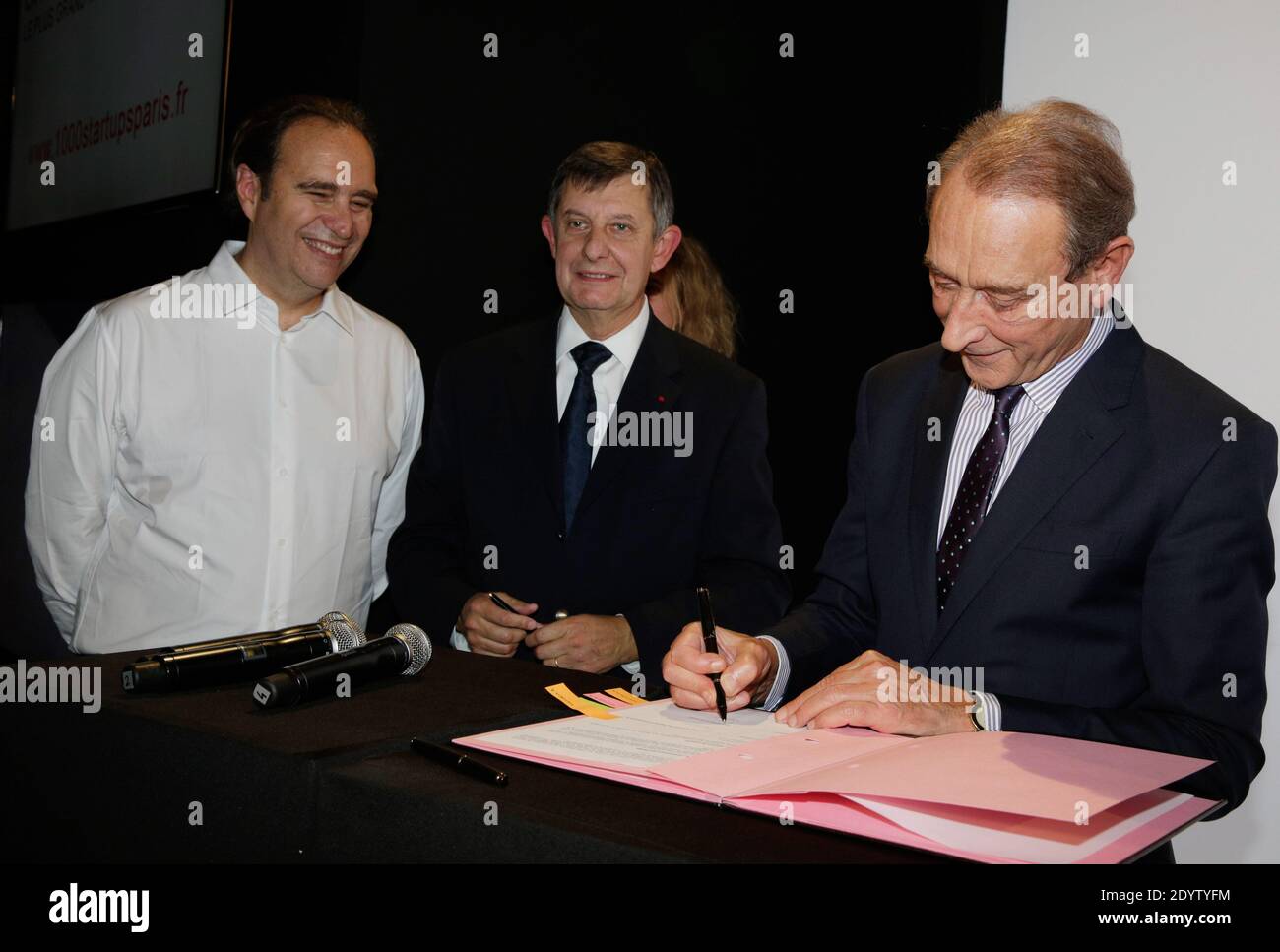 Xavier Niel, Jean-Pierre Jouyet and Bertrand Delanoe attending the ...