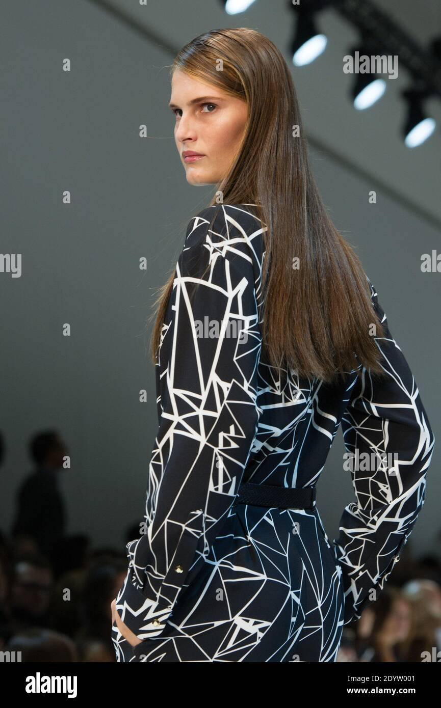 A model displays a creation by designer Marcel Marongiu for Guy Laroche ...