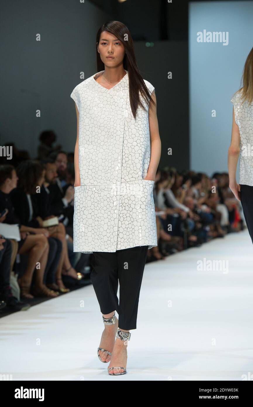 A model displays a creation by designer Marcel Marongiu for Guy Laroche ...