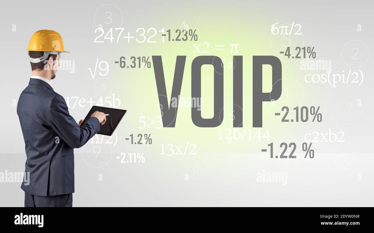 Technology Engineer in hard hat with VOIP abbreviation Stock Photo - Alamy