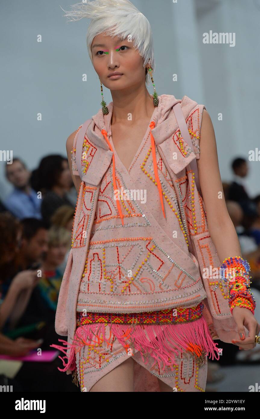 A model displays a creation by Manish Arora for his Spring-Summer 2014 ...