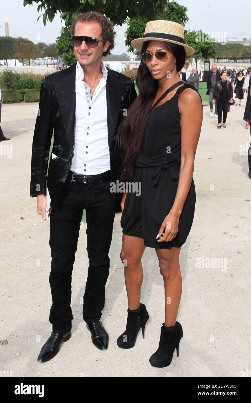 Mia Frye and a Guest attending Issey Miyake's Spring-Summer 2014 Ready ...