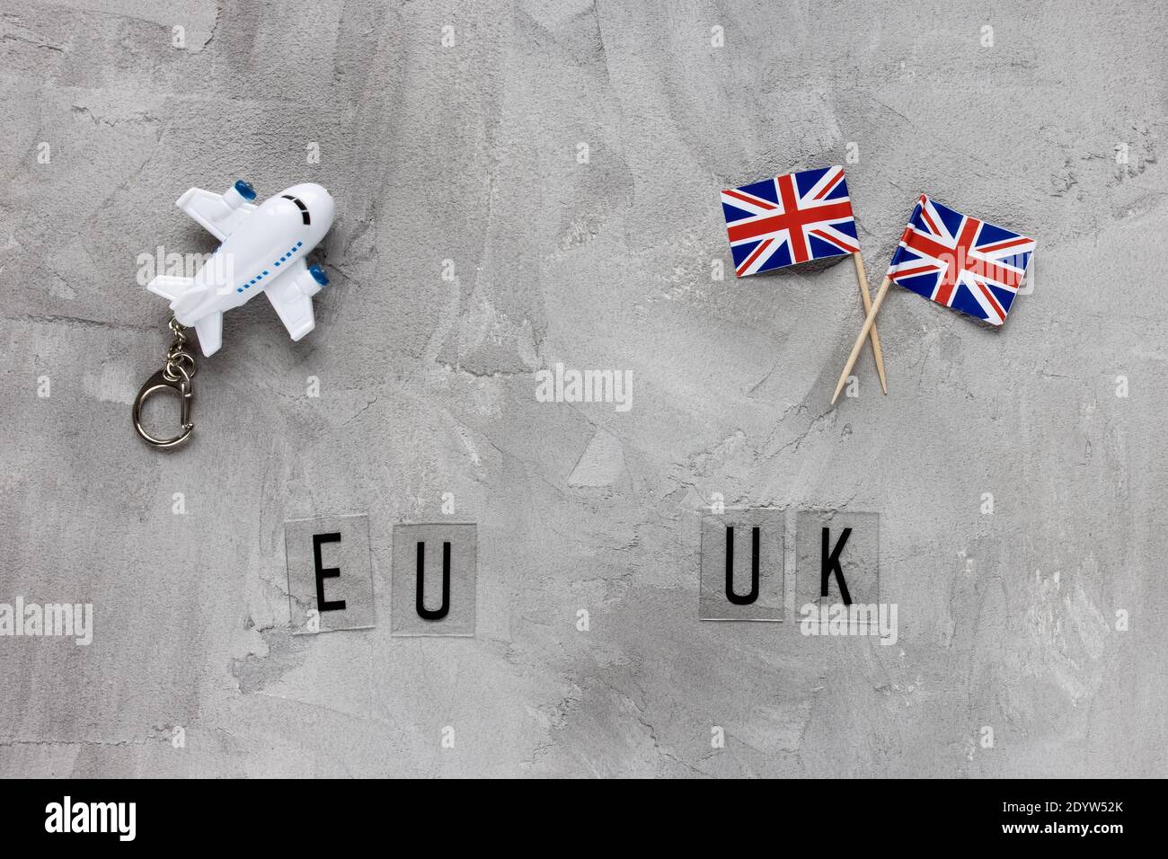 Airplane model, UK flags and text EU UK Stock Photo - Alamy