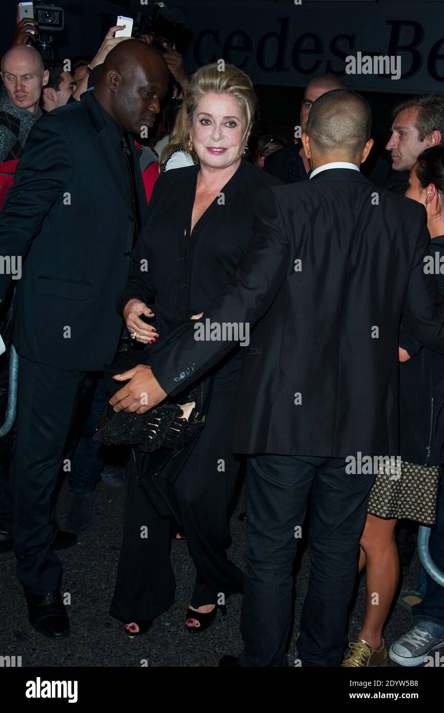 Catherine Deneuve attending Jean-Paul Gaultier's Spring-Summer 2014 ...