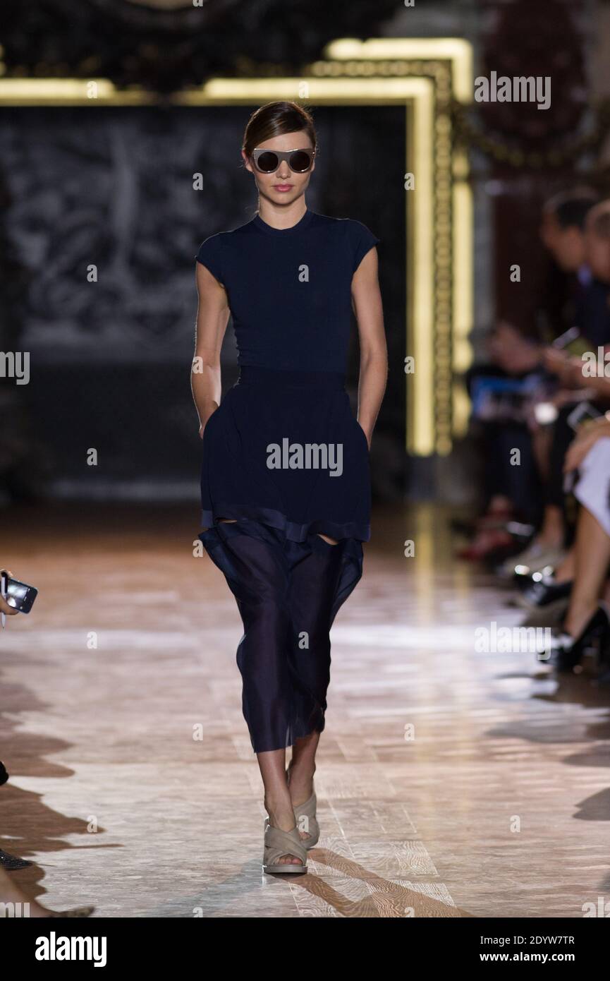 Miranda Kerr displays a creation by designer Stella McCartney for her ...