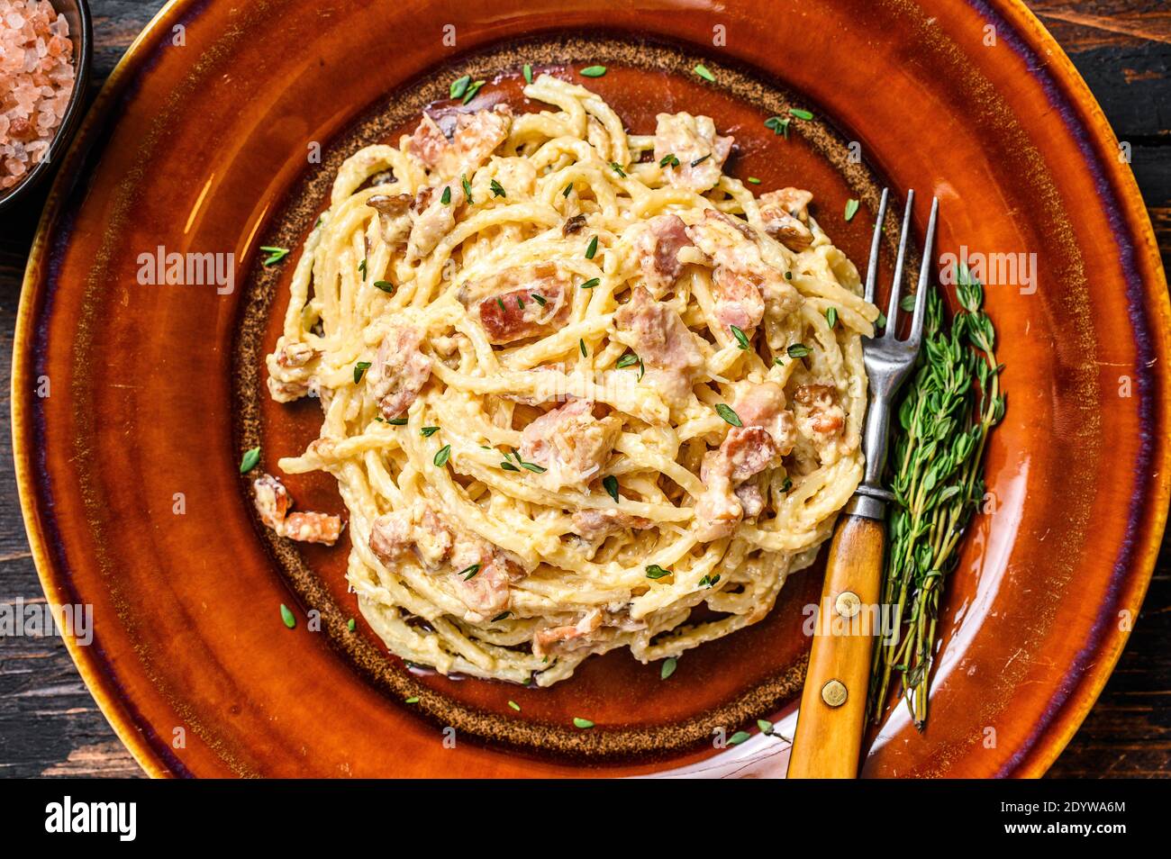 Italian Spaghetti Carbonara pasta with bacon, hard parmesan cheese and ...