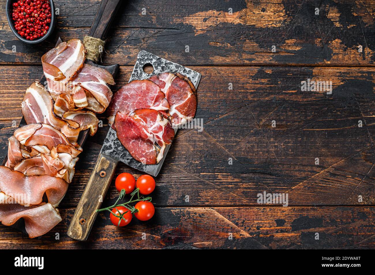 Meat antipasto board, pancetta, salami, sliced ham, sausage, prosciutto ...