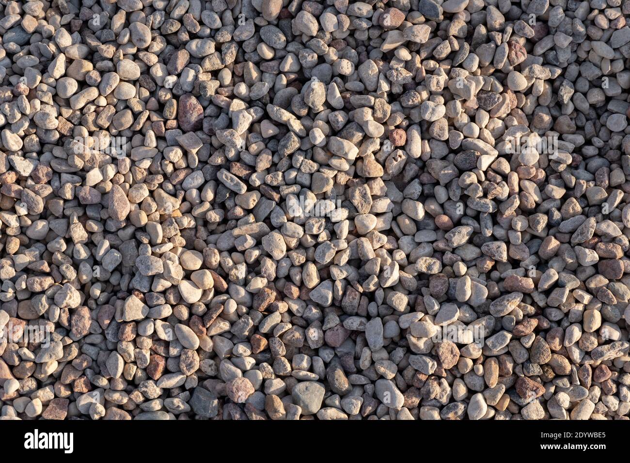 light small pebbles background texture with place for text Stock Photo ...