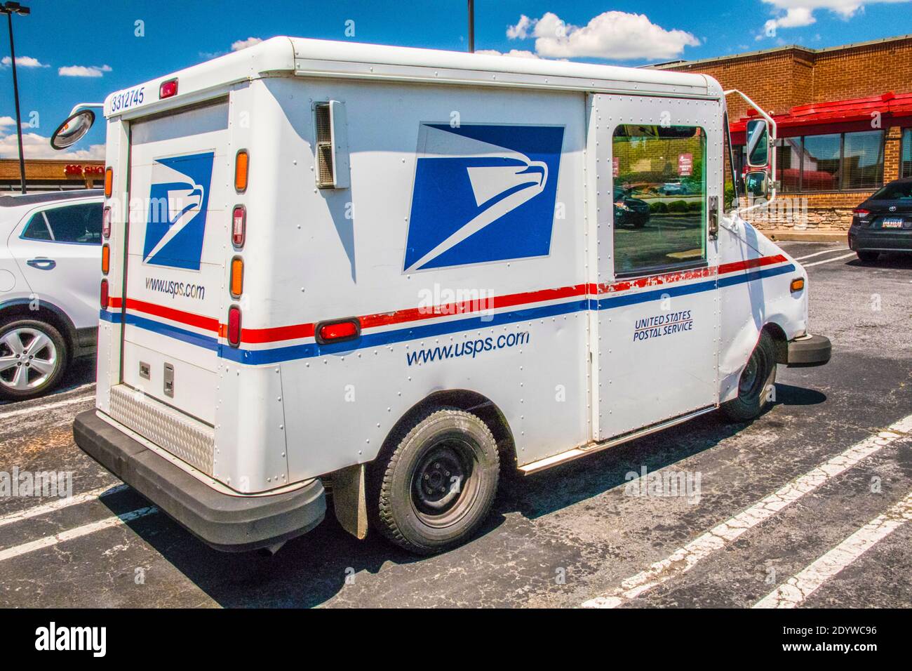 Gwinnett, County USA - 05 31 20: USPS mail delivery truck back corner ...