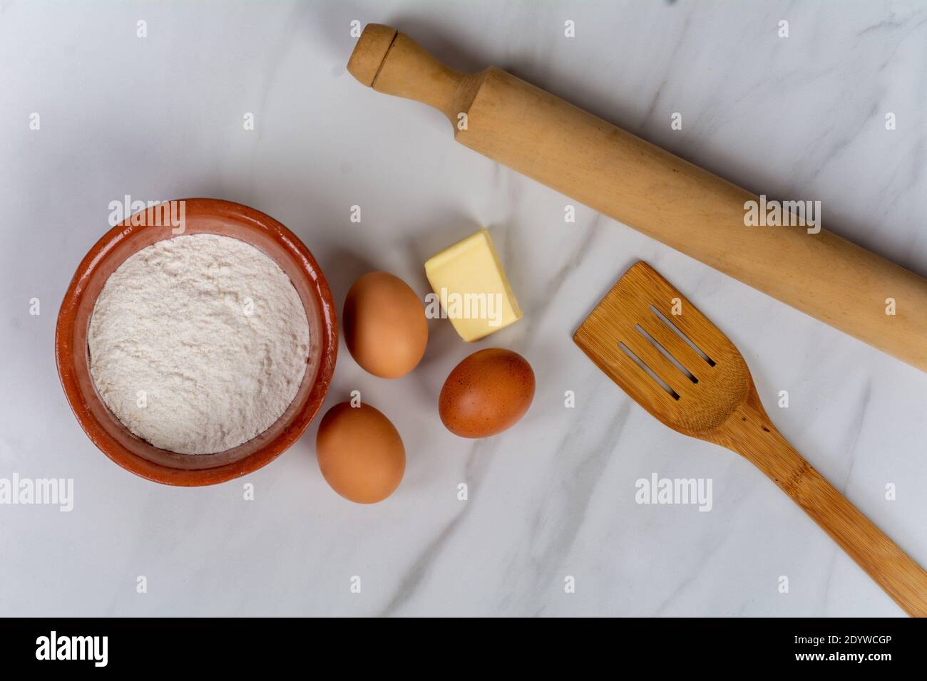 Kitchen tools, eggs, flour and butter Stock Photo - Alamy
